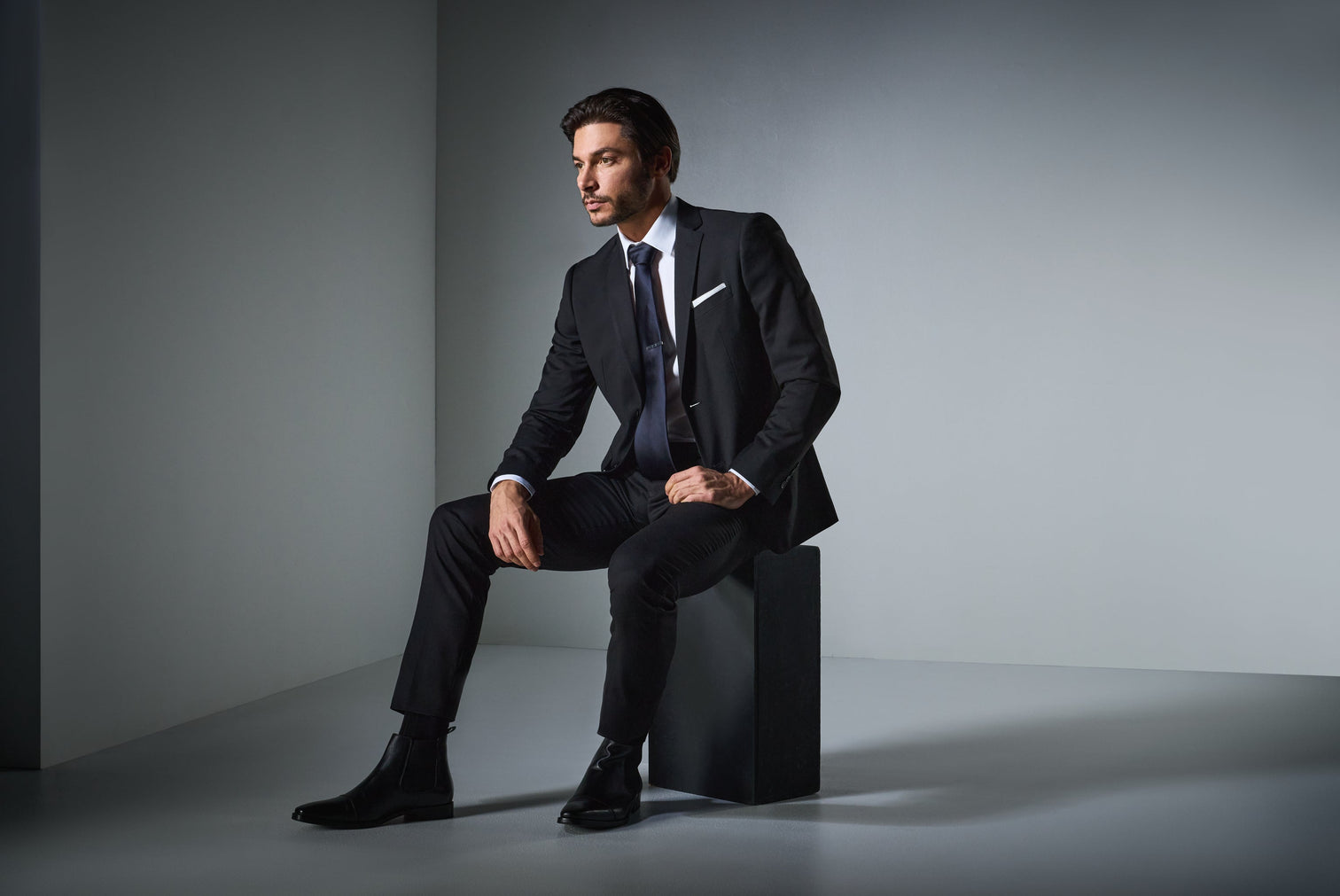 How to Style a Classic Black Suit: Timeless Style with Personality ...